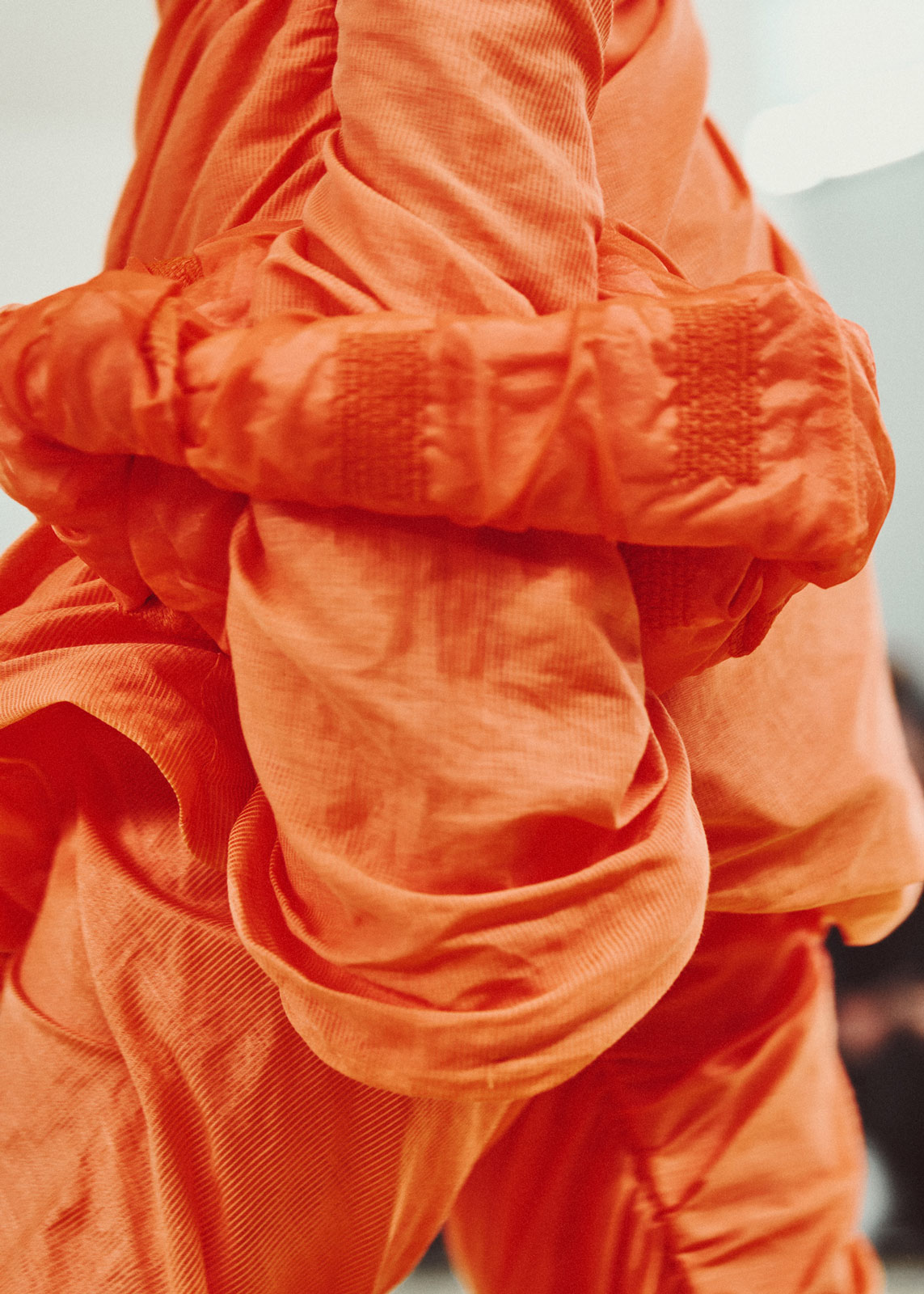 Issey Miyake materializes a quivering flame, flowing water